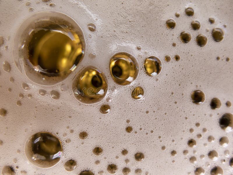Foam Beer with Small Bubbles Texture and Yellow Water. Top View Stock ...