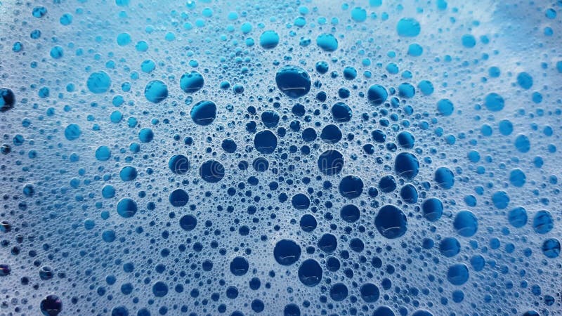 Foam with Bubbles Popping in Deep Blue Water Stock Video - Video of ...