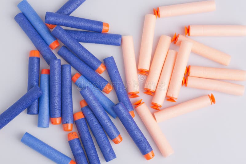 Blue and orange bullets stock photo. Image of plastic - 362570672