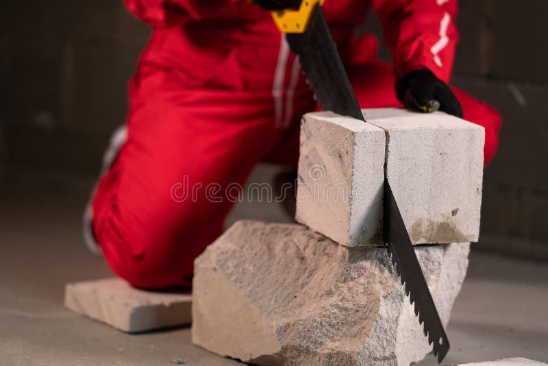 Foam Concrete Block Cut with a Saw Stock Image - Image of gloves, hand ...