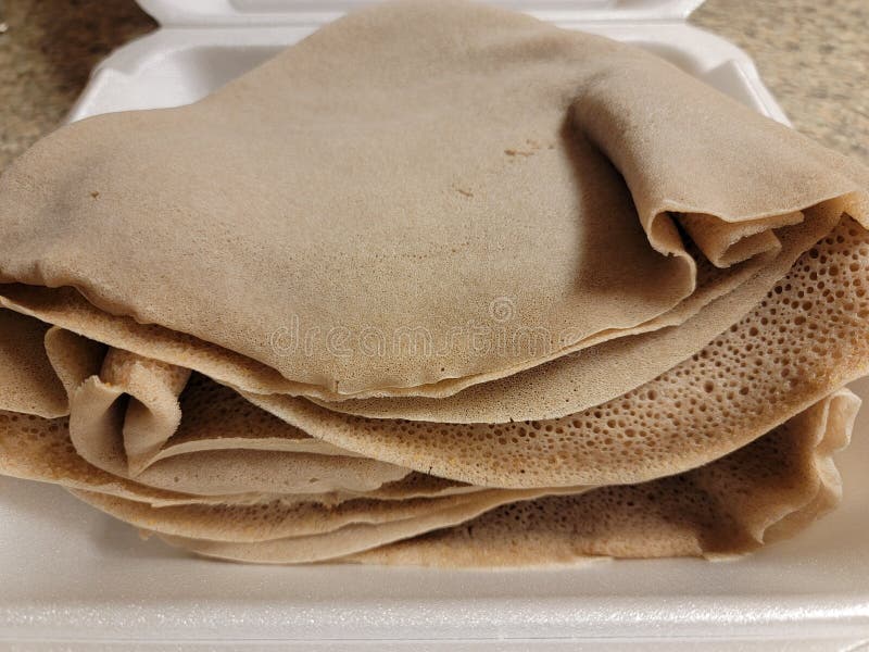 Foam Container with Stack of Ethiopian Bread Called Injera Stock Photo ...