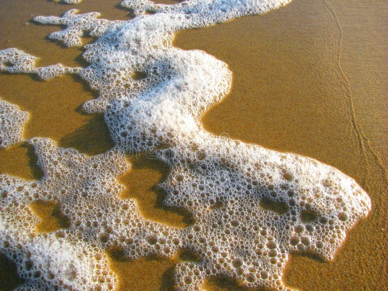 Foam on sand stock photo. Image of background, sand, nature - 6094652
