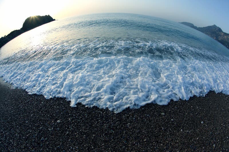 Foam Wave on the Beach at Dawn Stock Photo - Image of coast, splash ...