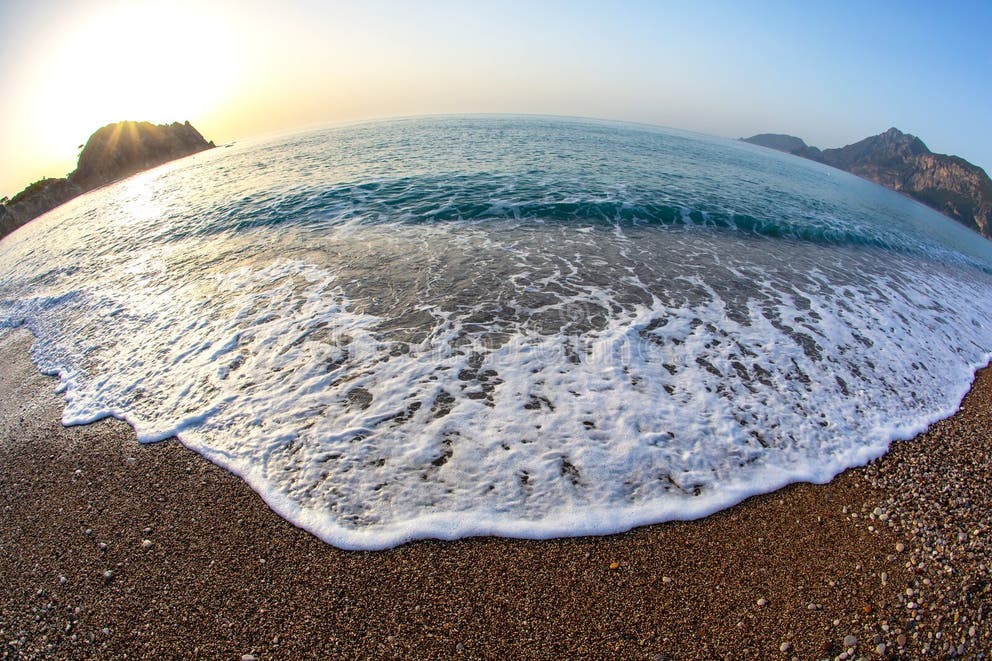 Foam Wave on the Beach at Dawn Stock Photo - Image of horizon, sunset ...