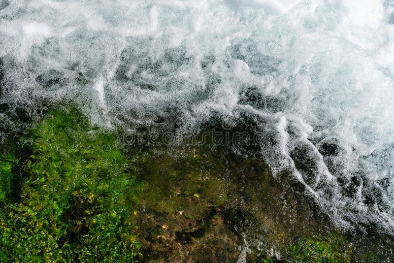 Foaming Clear Water and Green Algae at the Bottom Stock Image - Image ...