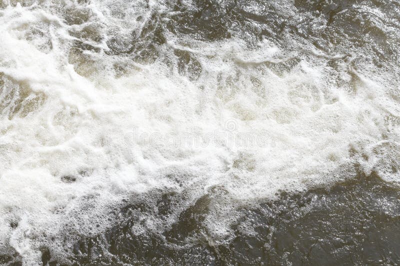 Foaming water in a river stock photo. Image of current - 322051670
