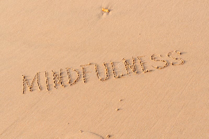 Foamy Sea Water and Inscription Mindfulness on the Sandy Beach Stock ...