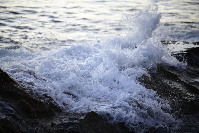 Foamy Sea Waves Splash Over the Rocks Near the Shore Stock Photo ...