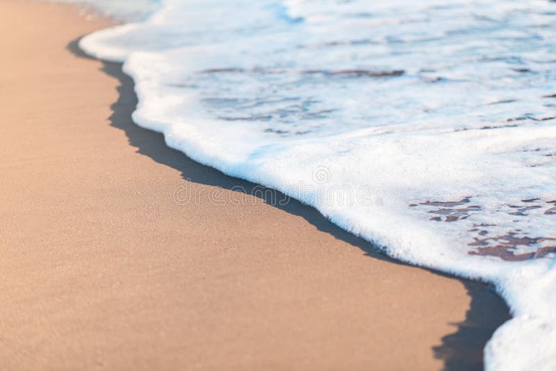 Foamy Wave Running Onto a Sandy Beach Stock Image - Image of surf, blue ...