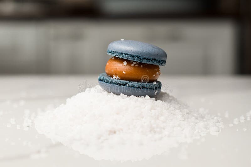 Focus on a Blue Macaroon with Chocolate Cream Lying on a Pile of ...