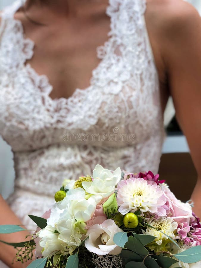 Focus on a Bridal Bouquet in the Hands of a Bride Stock Photo - Image ...