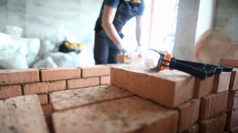Skilled bricklayer working stock photo. Image of engineer - 301104026