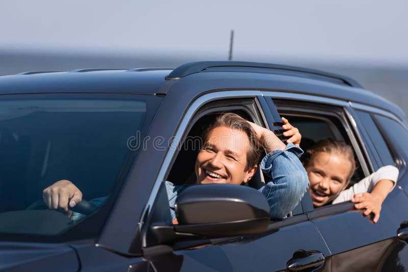 Focus of Father Driving Car Near Stock Photo - Image of relationship ...