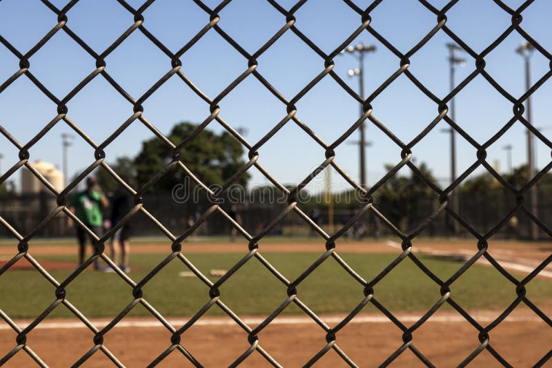 Focus on the Fences with Background Baseball Field Out of Focus Stock ...