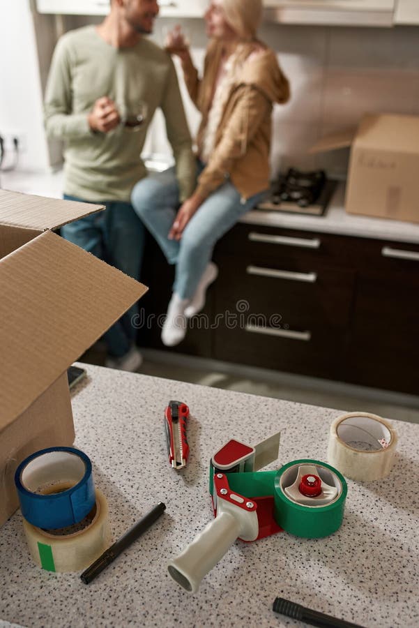 Objects for Packing on Table with Blur Couple Stock Image - Image of ...