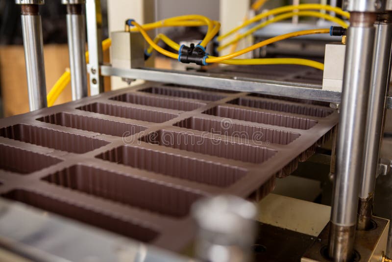 Focus on Freshly Made Plastic Boxes. the Boxes Have Just Come Out of ...