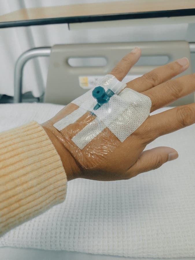 Focus on the Hand of a Patient in Hospital Ward Stock Photo - Image of ...