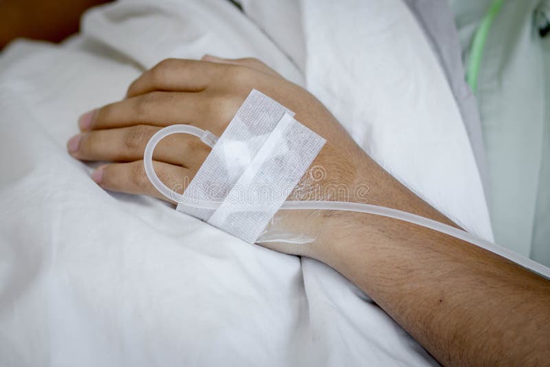 Focus on the Hand of a Patient in Hospital Ward. Patient on the ...