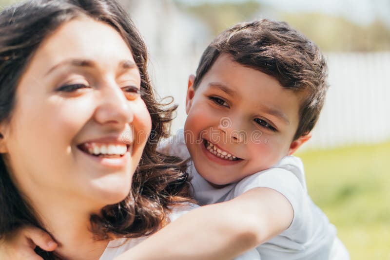 Focus of Happy Son Hugging Cheerful Mother Stock Image - Image of ...