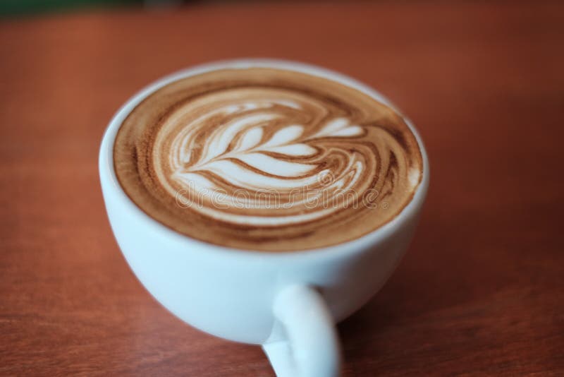 Focus Hot Latte of Cup on Wood Stock Photo - Image of brown, gold: 85549026