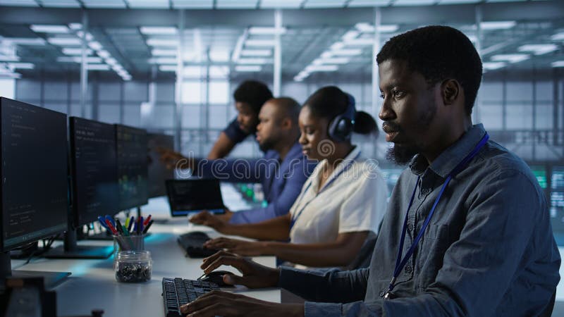 Focus on Man in Server Hub Office Using Artificial Intelligence Stock ...