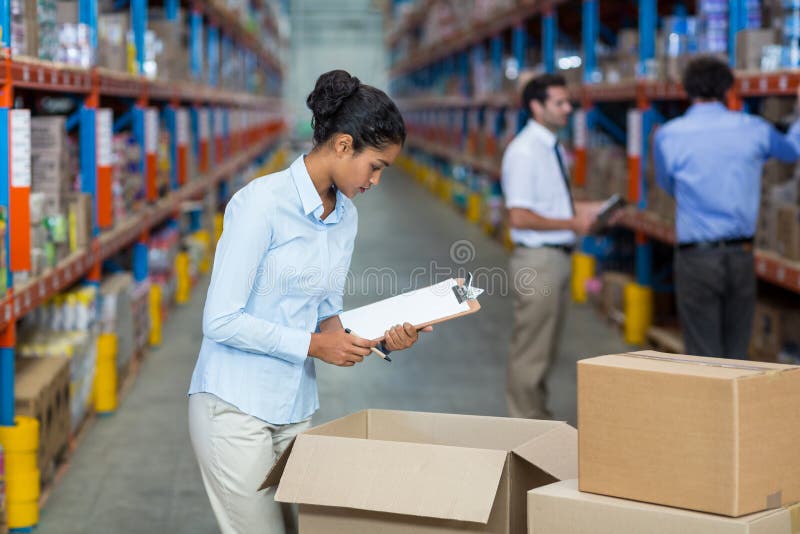 Focus of Manager is Checking Some Cardboard Boxes Stock Image - Image ...