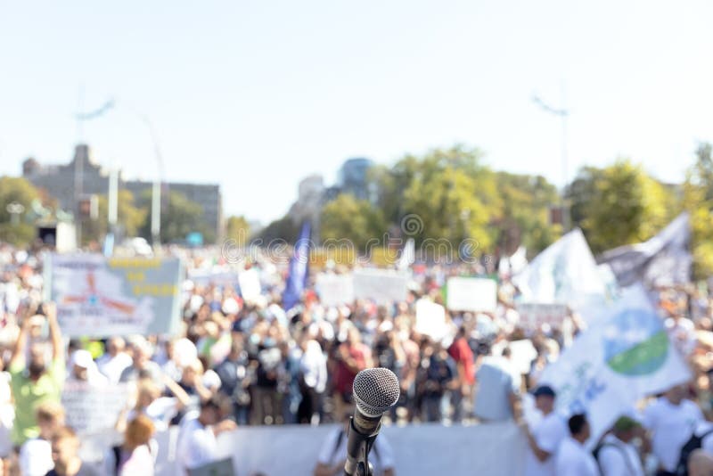 Protest or Public Demonstration, Focus on Microphone, Blurred Crowd of ...