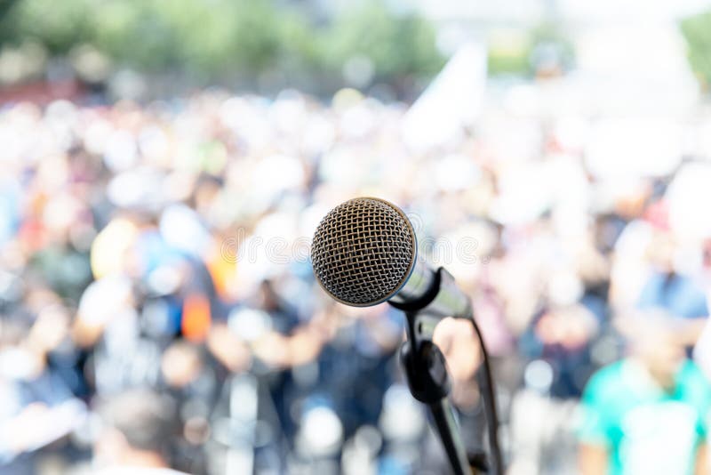 Political Protest. Demonstration. Microphone in Focus Against Bl Stock ...