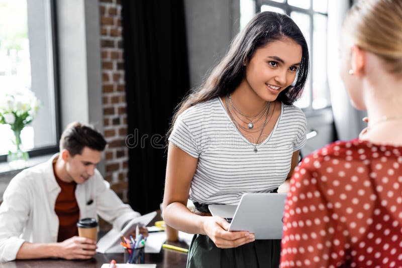 Focus of Multiethnic Students Smiling and Looking at Each Other in ...