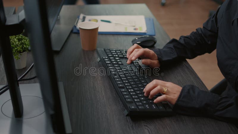 Focus on Programer Hands Typing Code on Keyboard while Looking at Computer Screen Stock Footage ...
