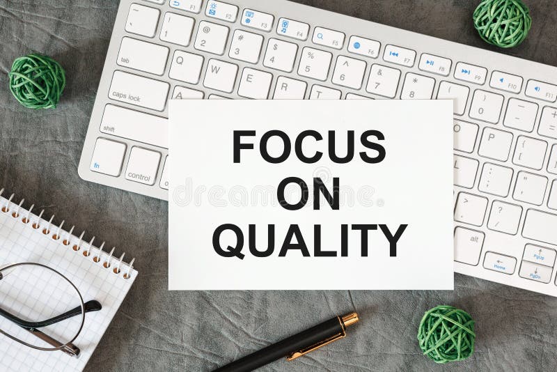 FOCUS on QUALITY is Written in a Document on the Office Desk Stock ...