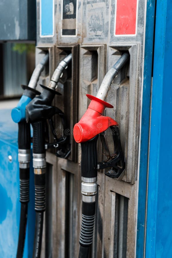 Focus of Red and Blue Gas Pumps with Fuel on Gas Station Stock Image ...