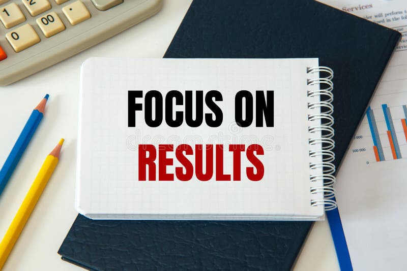 Focus on Results is Written on a Notepad with Office Accessories Stock ...