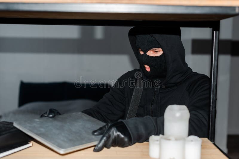 Focus of Robber in Balaclava Taking Stock Photo - Image of ...