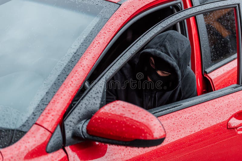 Focus of Robber in Mask Sitting Stock Image - Image of stealing ...