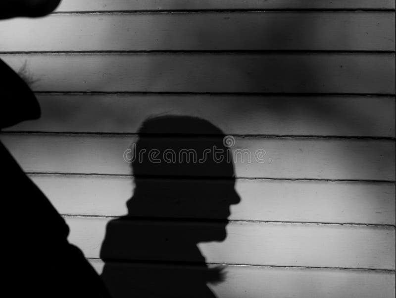 Focus on the Shadow on a Wall of a Person Stock Image - Image of ...