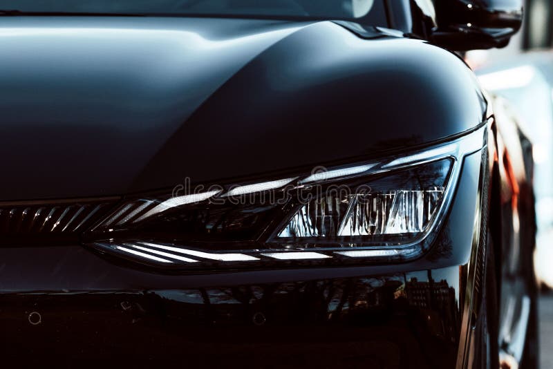 Focus Shot of the Front Light of a Black Modern Car. Stock Image ...