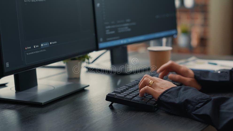 Focus on Software Developer Hands Typing Source Code on Keyboard while ...