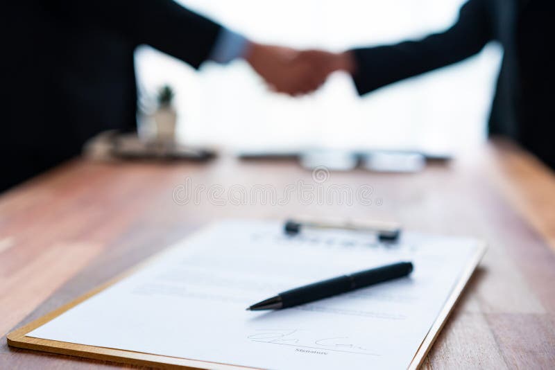 Focus Table Top View of Contract Document on Meeting Table. Jubilant ...