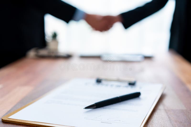 Focus Table Top View of Contract Document on Meeting Table. Jubilant ...