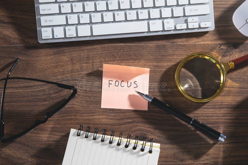 Focus Text on Sticky Note with a Business Objects Stock Photo - Image ...