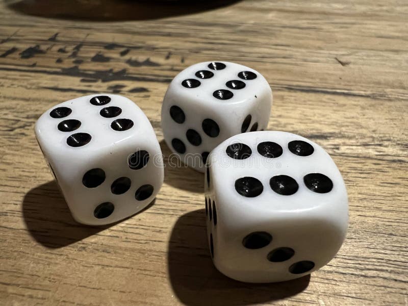 Three dice with six eyes stock photo. Image of game - 251716560