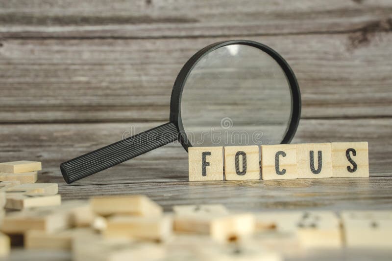 Focus Word Written in Wooden Cube Stock Image - Image of clips, hands ...