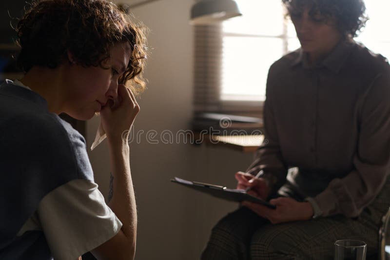 Focus on Young Crying Brunette Woman Visiting Her Psychotherapist Stock ...