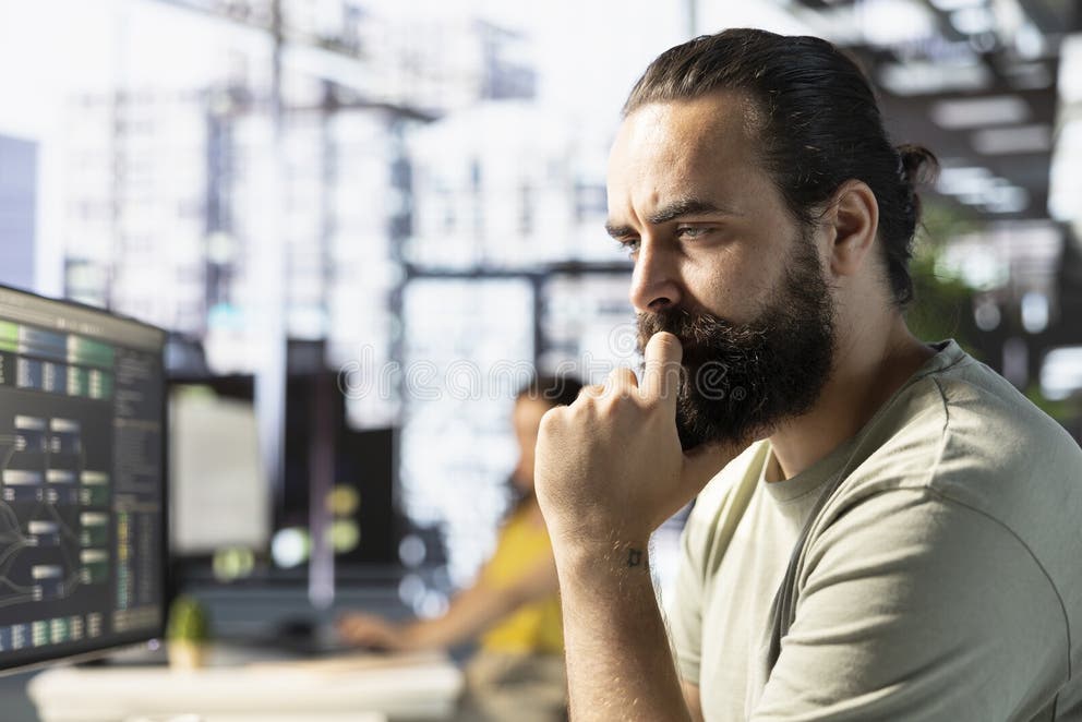 Focused Admin Thinking How To Use Cloud Computing Resources Stock Photo ...