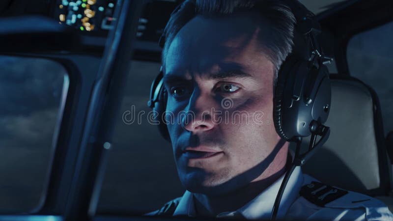 Airline Pilot Navigating Stormy Skies in Airplane Cockpit Stock Footage ...
