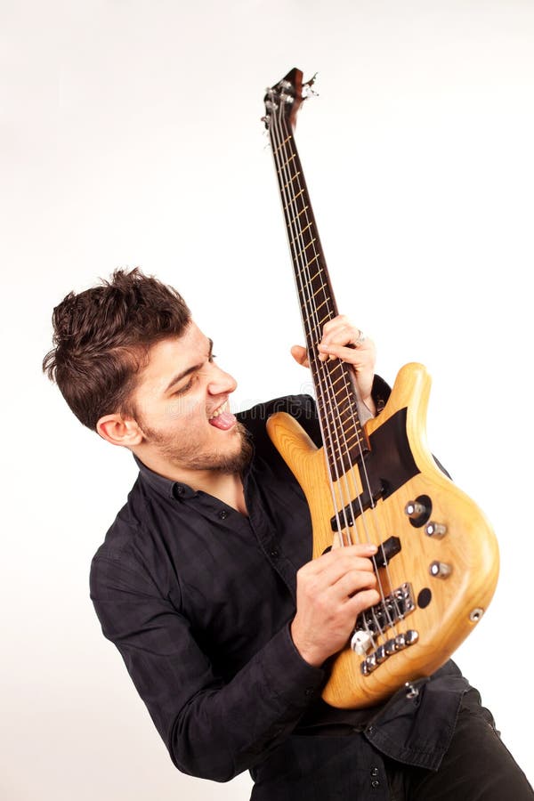 Focused Bass Player in Black Stock Image - Image of instrument ...