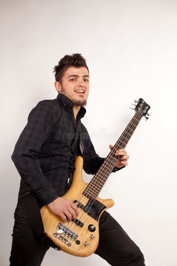 Focused Bass Player in Black Stock Image - Image of instrument, audio ...