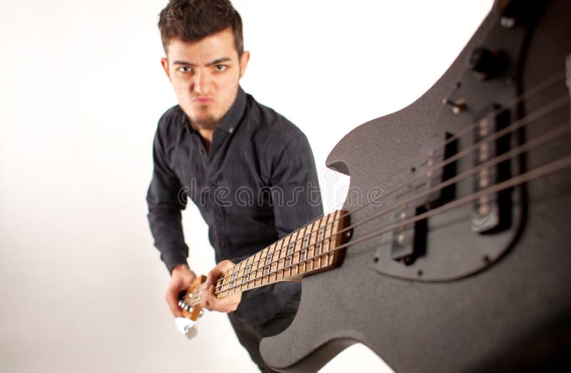 Focused Bass Player in Black Stock Photo - Image of black, electric ...