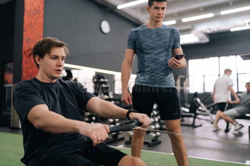 Handsome Beginner Sportsman Doing Side Lateral Raise with Dumbbells ...